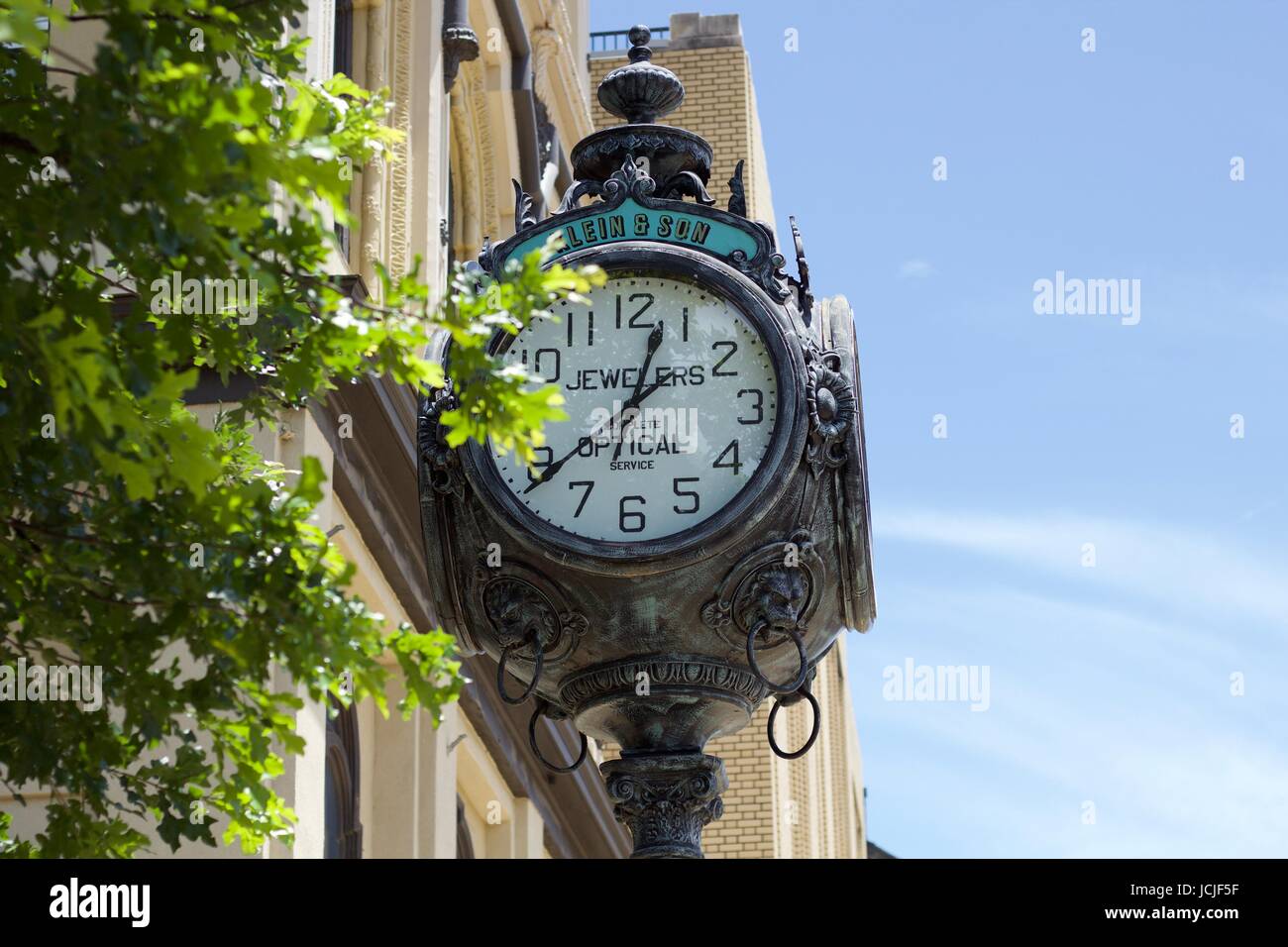outdoor architectural clock tree building Stock Photo - Alamy