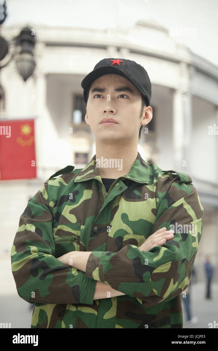 Standing looking away authority flag hi-res stock photography and ...