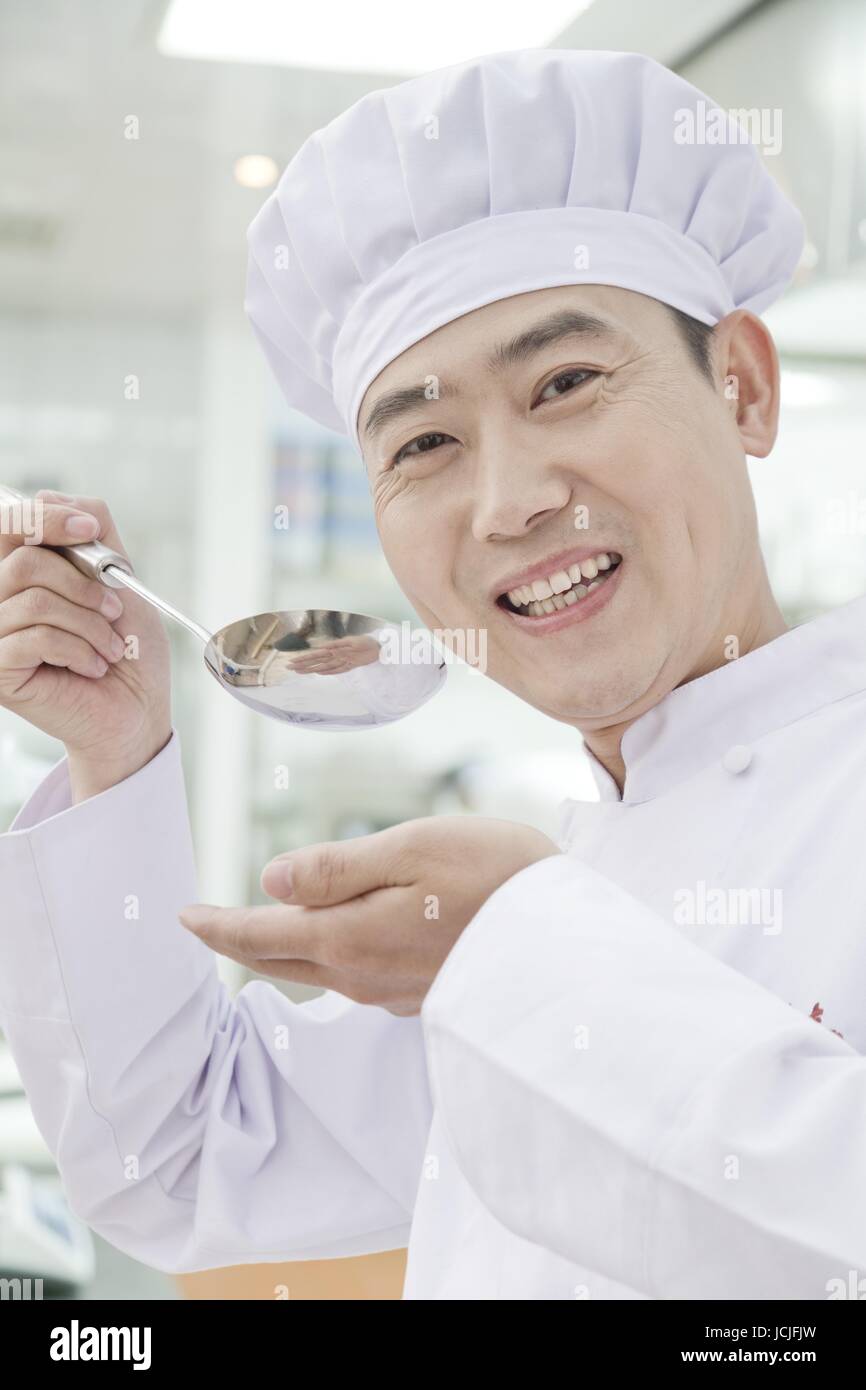 Close up chef smiles laughs hi-res stock photography and images - Alamy