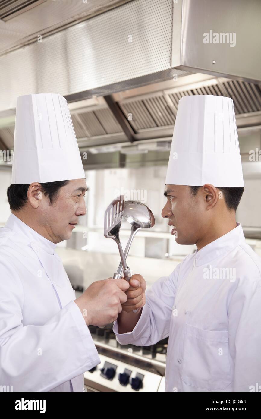 Chef fighting hi-res stock photography and images - Alamy