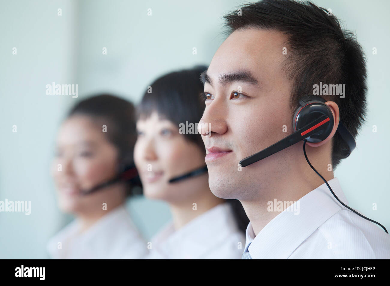 Three chinese men sit talking in beijing hi-res stock photography and ...