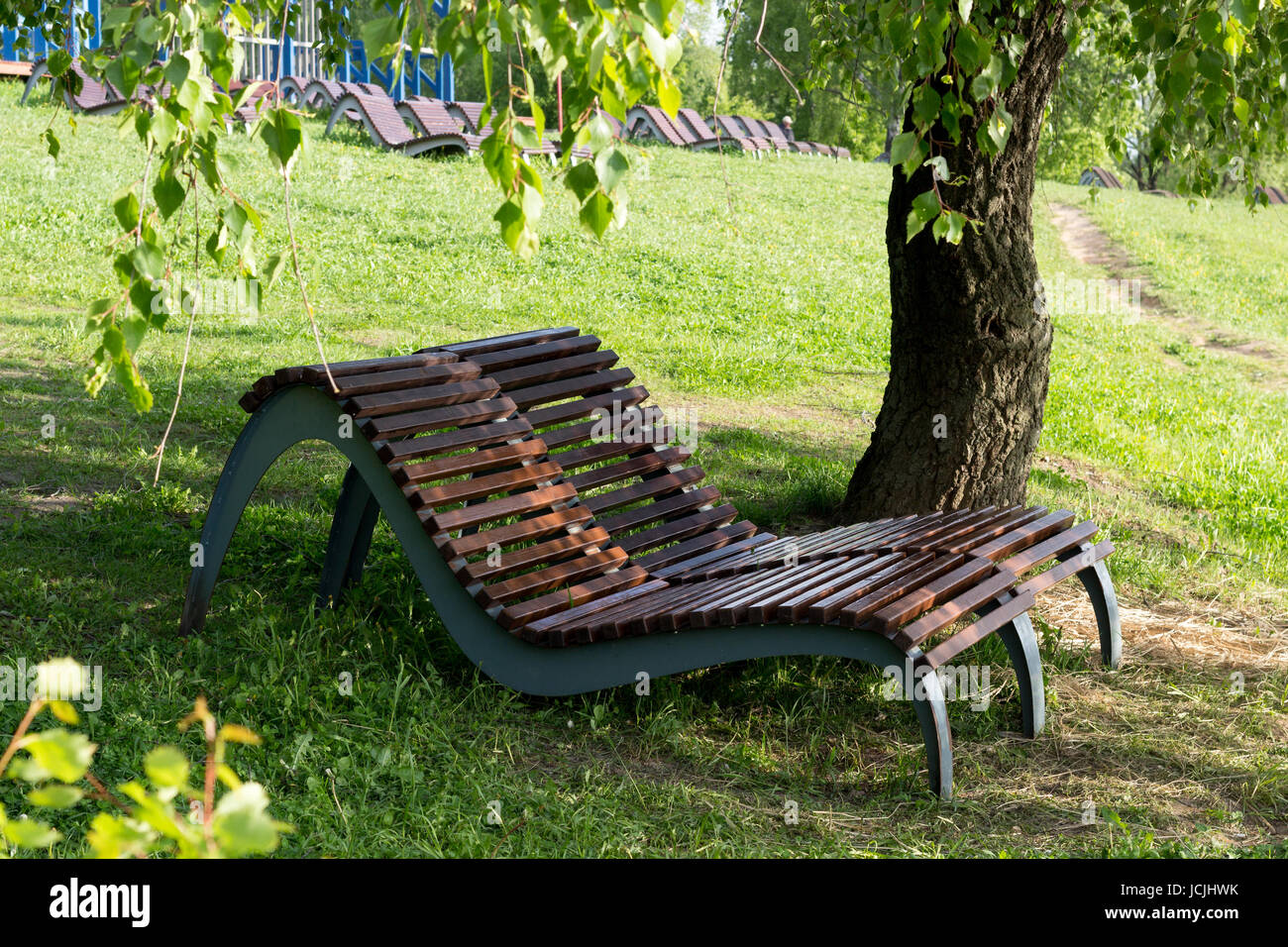 Table chair under tree in hi-res stock photography and images - Alamy