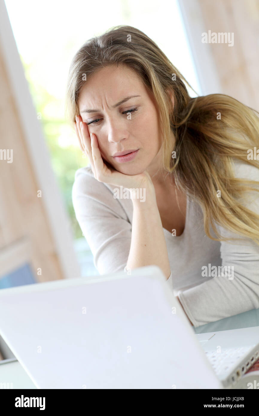 Attractive woman worried look working hi-res stock photography and ...