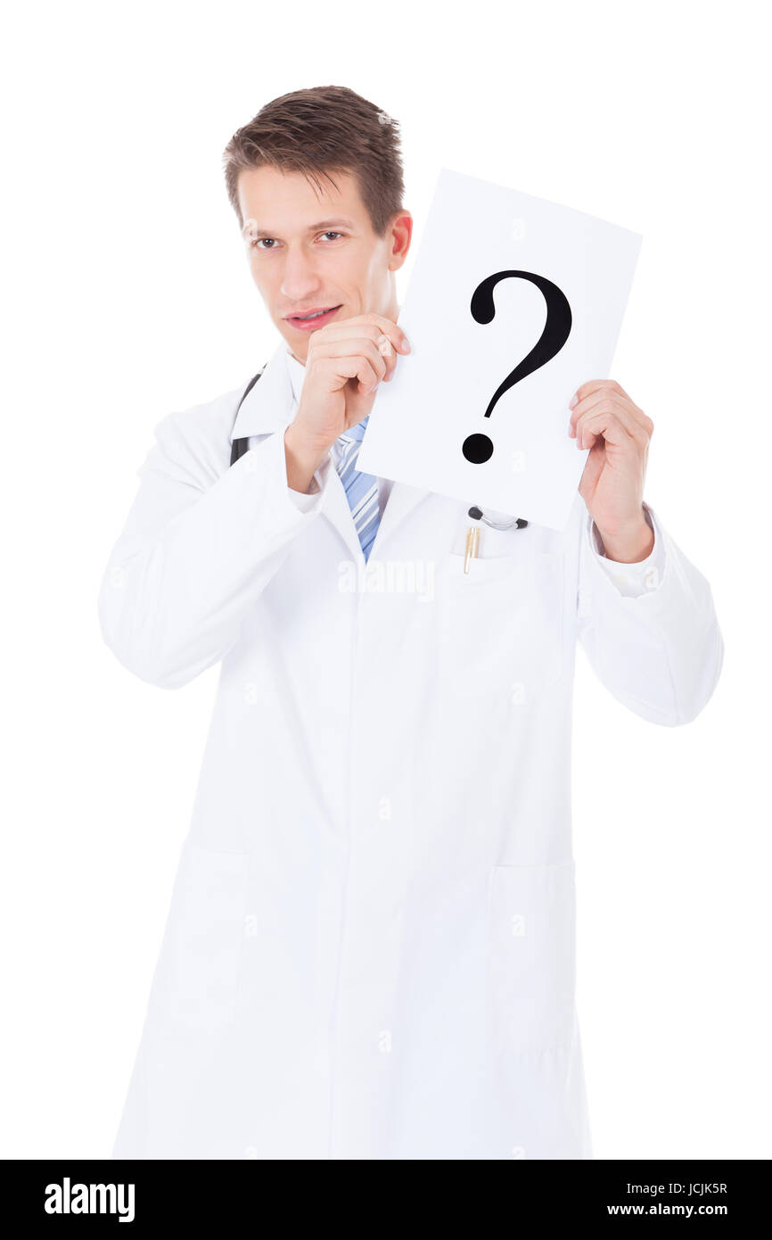 Close-up Of Doctor Holding Question Mark Sign In Front Of Face Stock ...