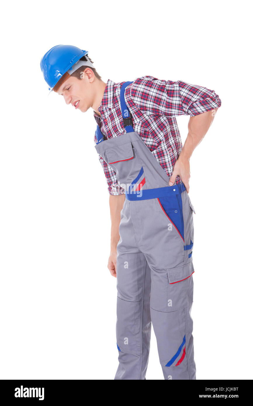 Young Male Worker Suffering From Back Pain Over White Background Stock ...