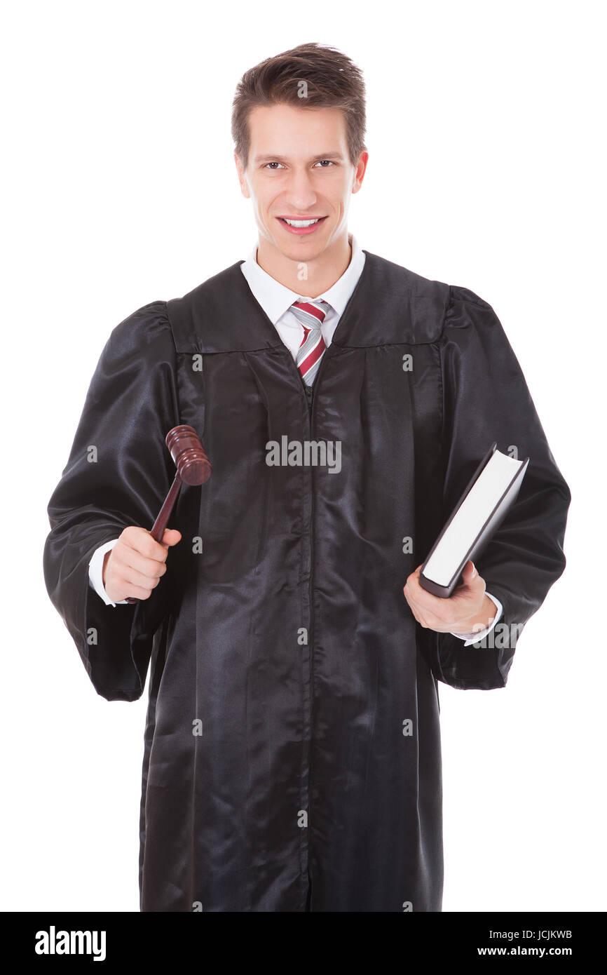Male Judge Holding Gavel And Book Over White Background Stock Photo - Alamy