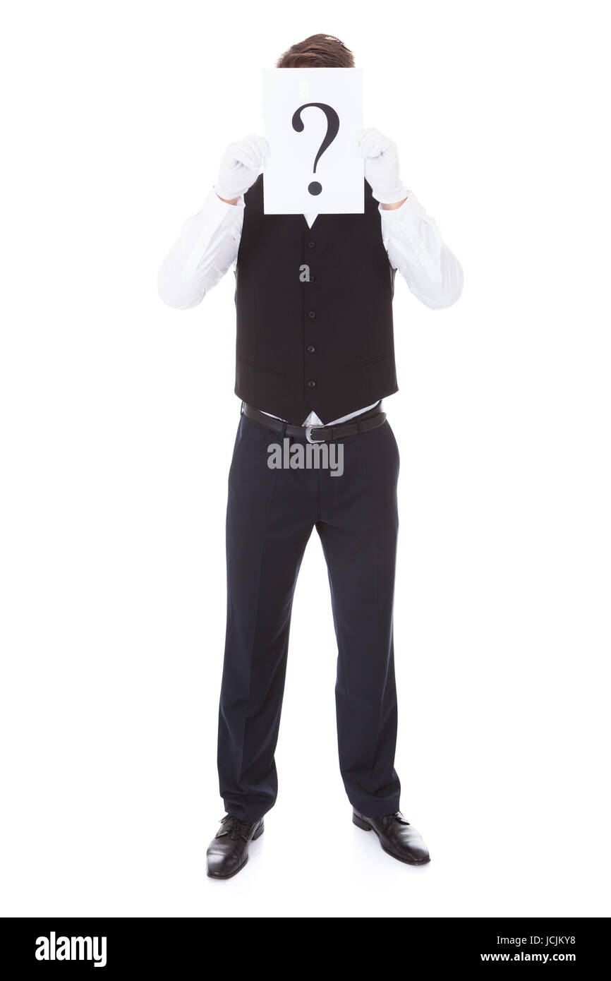 Male Waiter Holding Question Mark On Board Over White Background Stock ...