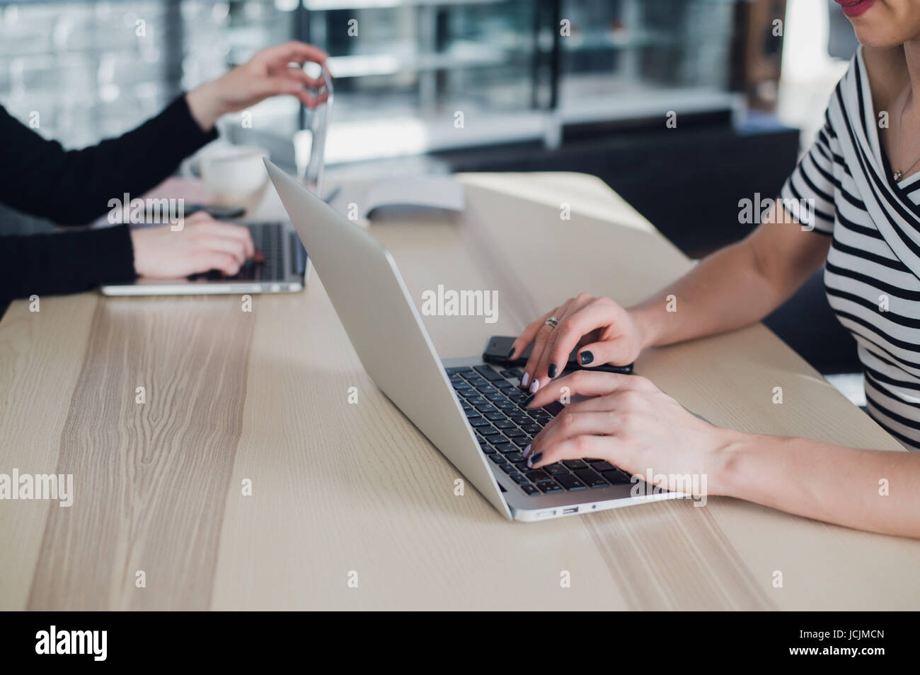 Female workers hand typing on hi-res stock photography and images - Alamy