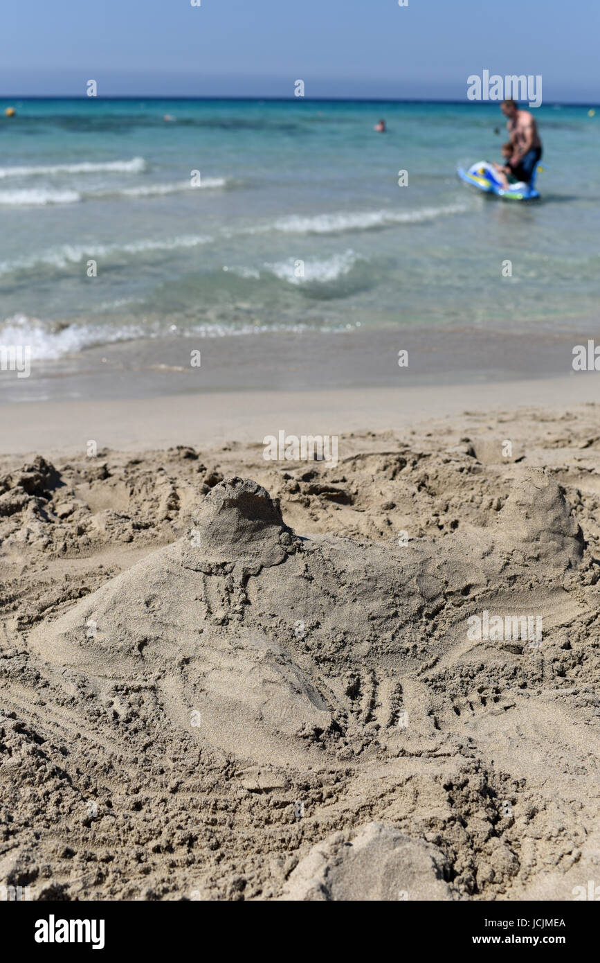 Shark and sculpture, Son Bou beach, Menorca, Spain Stock Photo - Alamy