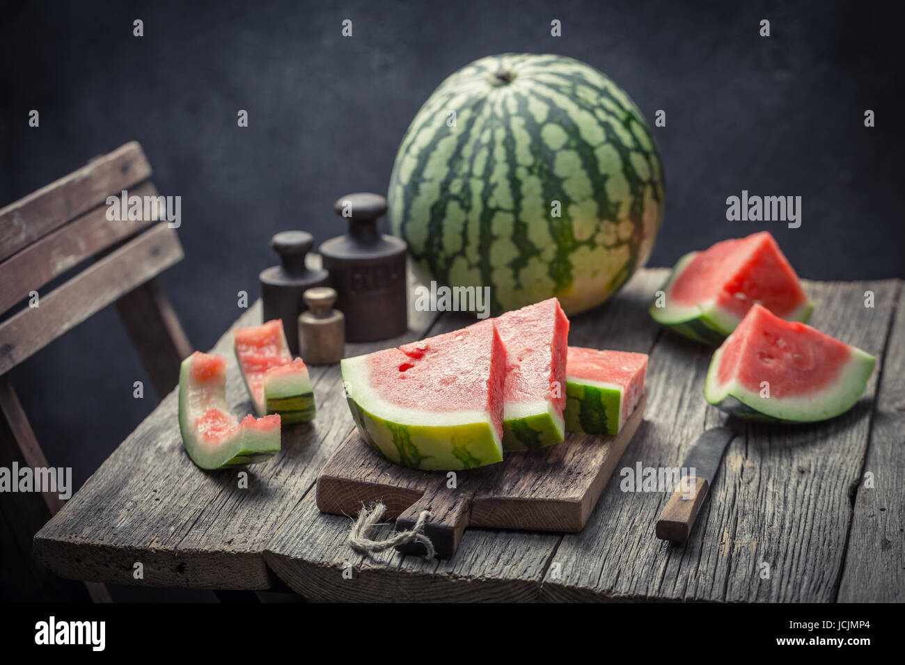 Sweet watermelon in a old rustic kitchen Stock Photo - Alamy