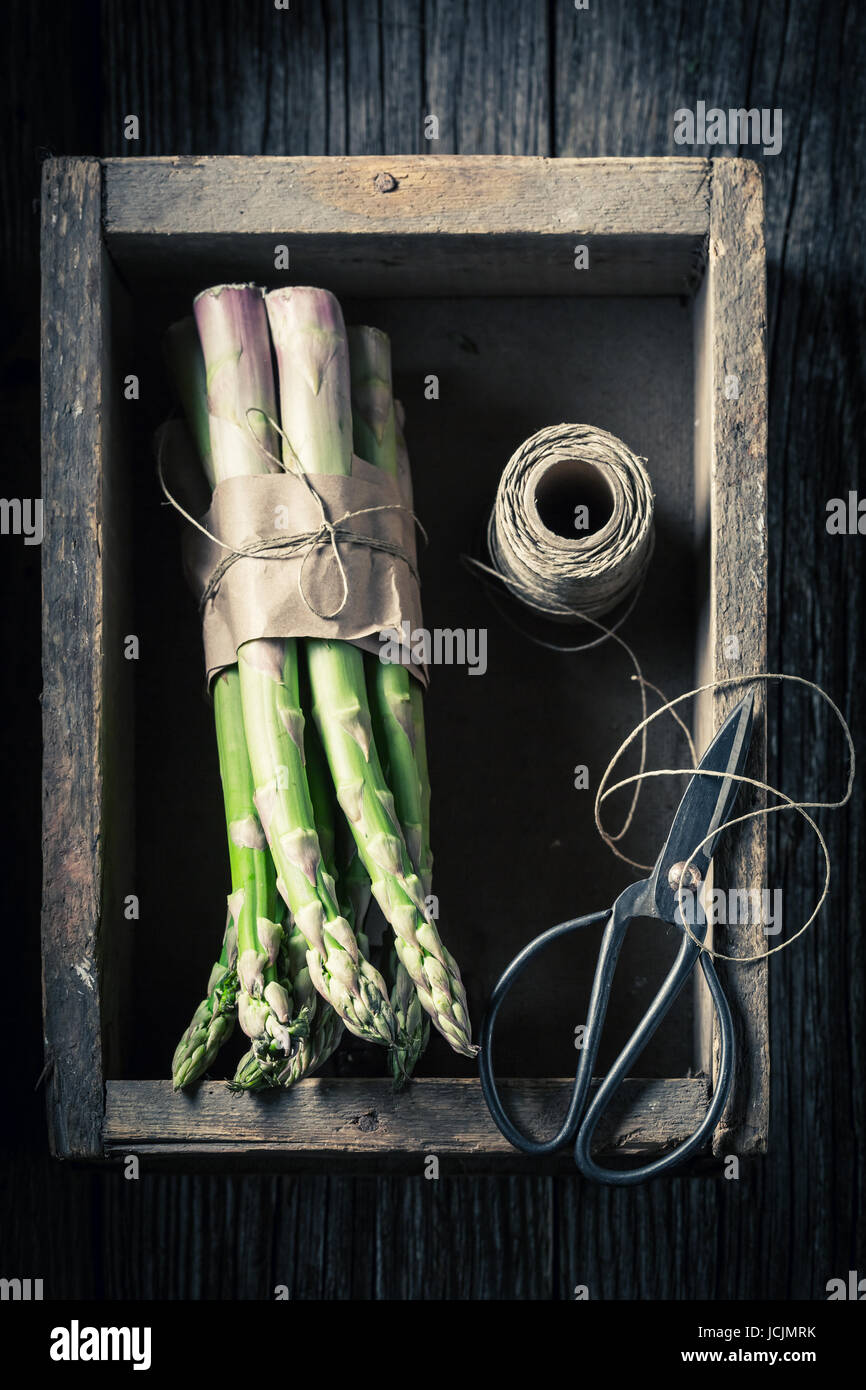 Closeup of green asparagus in a wooden box Stock Photo - Alamy