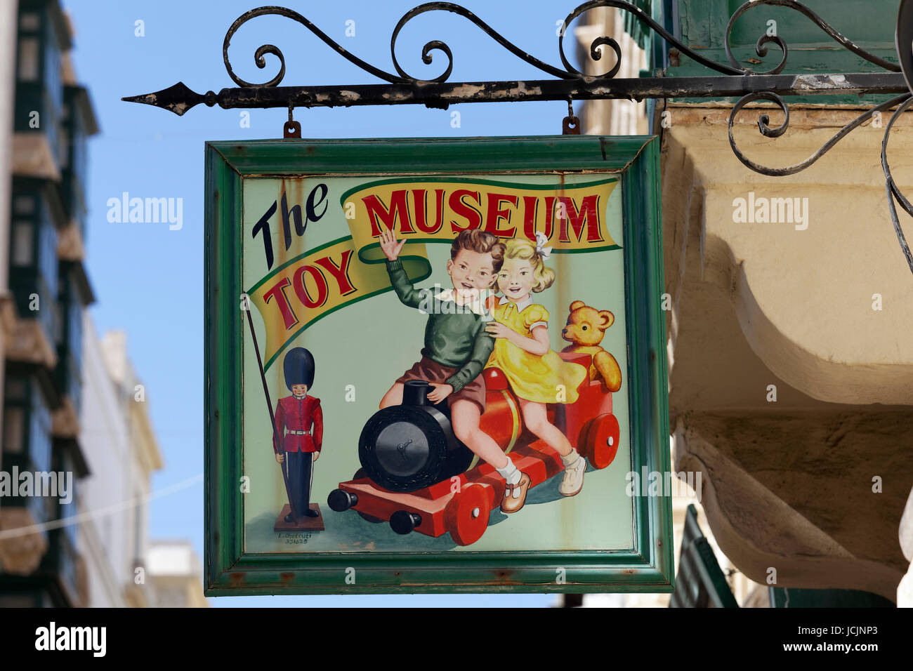 Children riding on a toy-train, painted sign at Toy Museum, Toy Museum ...