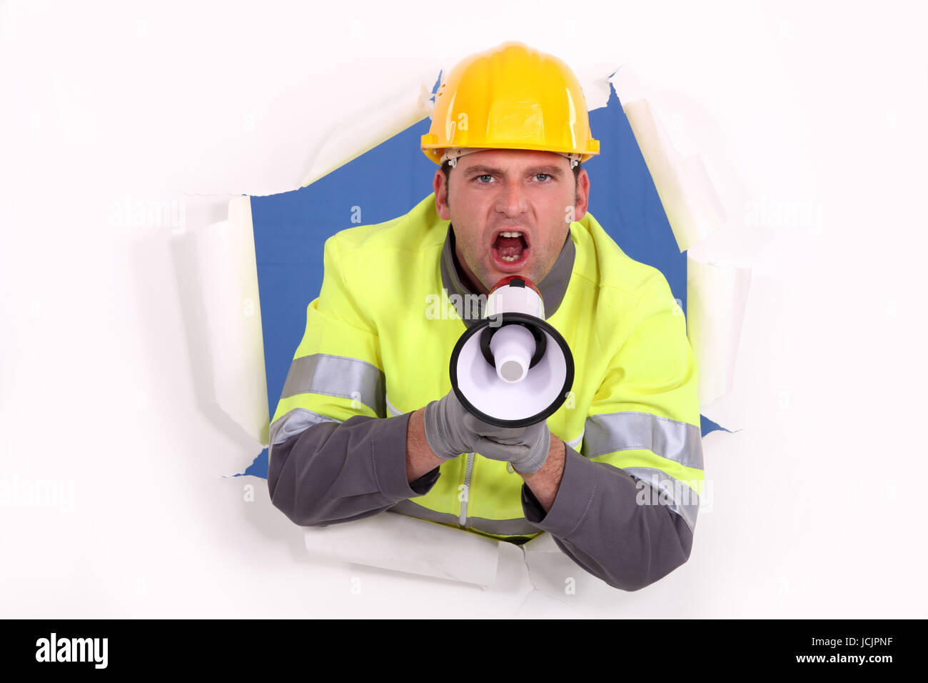 road worker yelling in a megaphone Stock Photo - Alamy