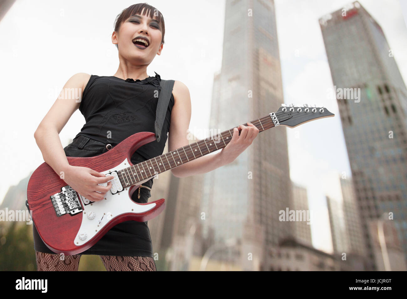 Smile three quarters of length hi-res stock photography and images - Alamy