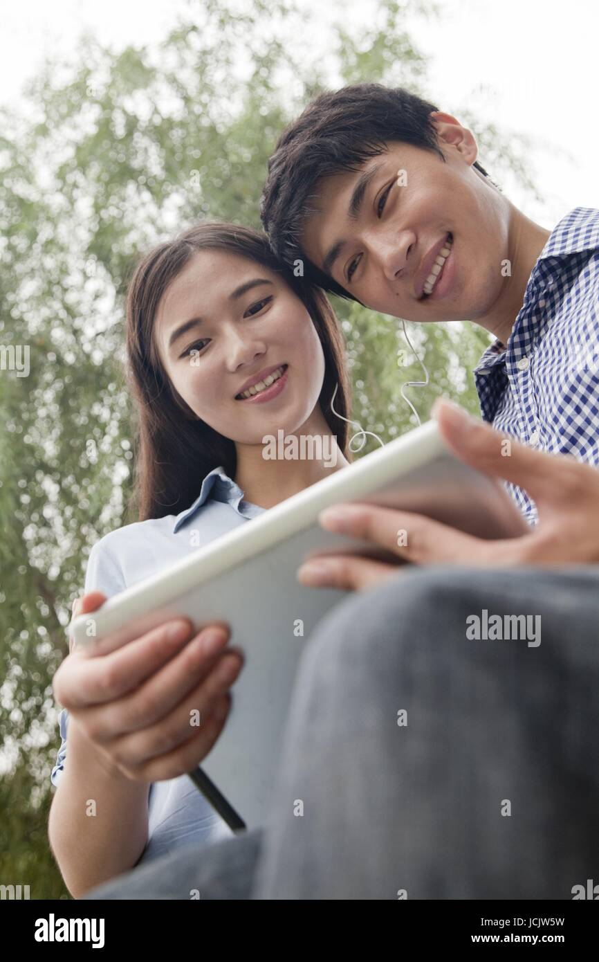 Three women laughing sharing joyful hi-res stock photography and images ...