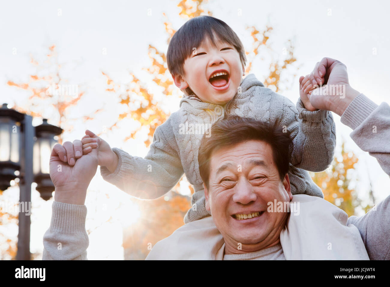 Black grandpa holding hands hi-res stock photography and images - Alamy