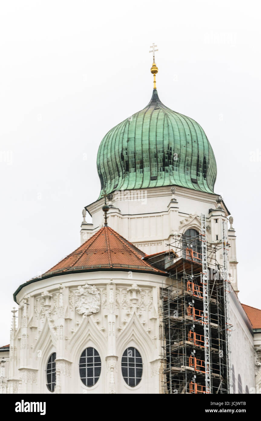 St. Stephens Basilica is an old white church with green metal domes on ...