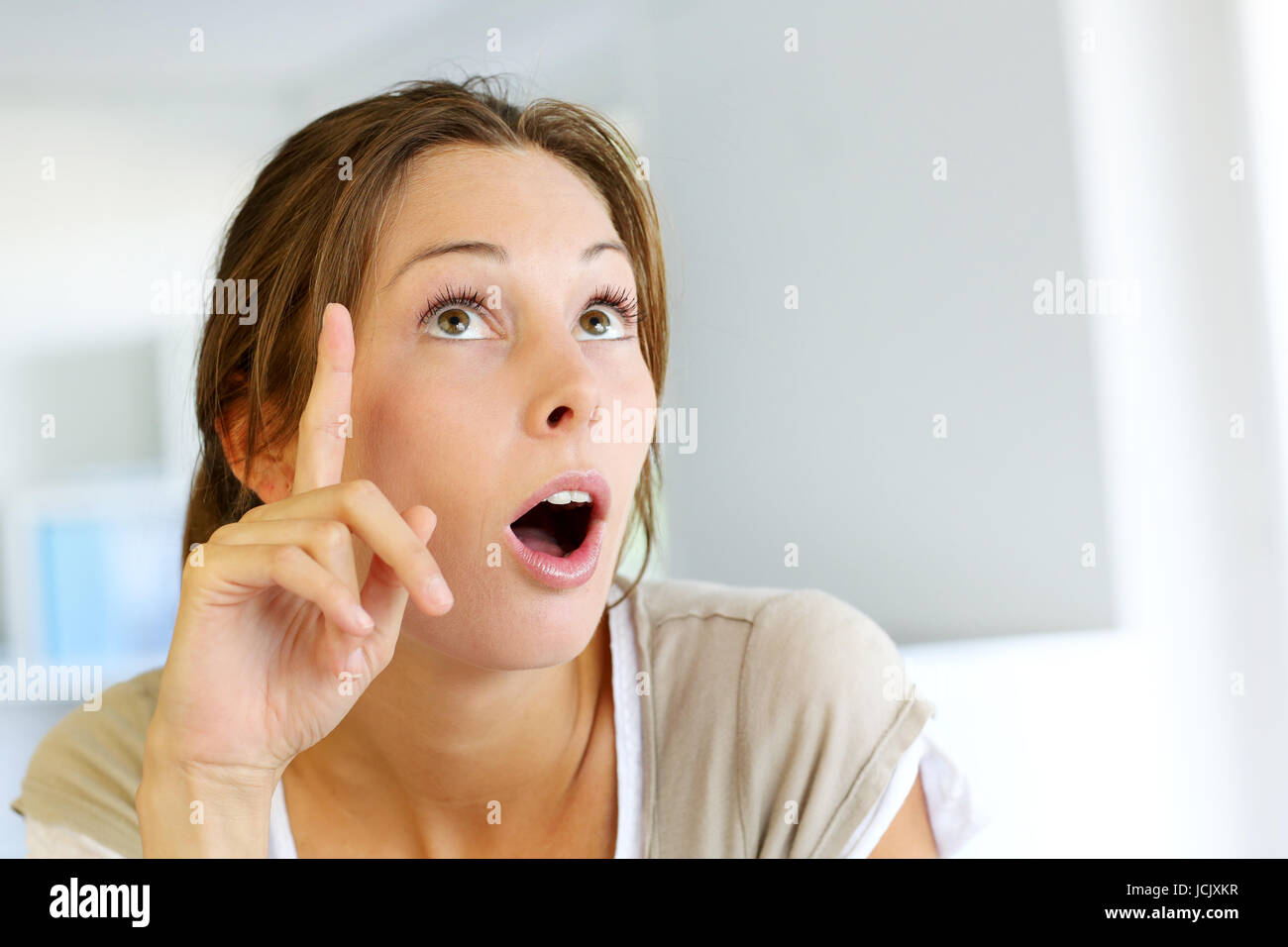 Surprised woman having idea hi-res stock photography and images - Alamy