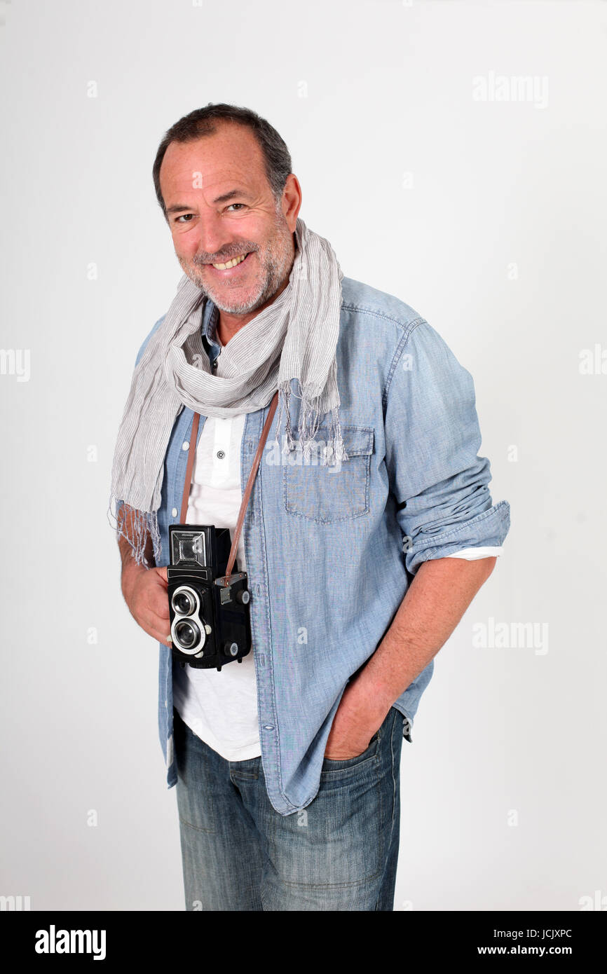 Photographer standing on white background Stock Photo - Alamy