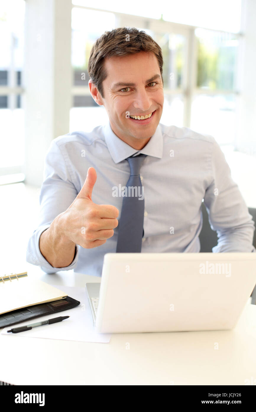 Businessman showing thumb up Stock Photo - Alamy Businessman showing thumb up Stock Photo - Alamy