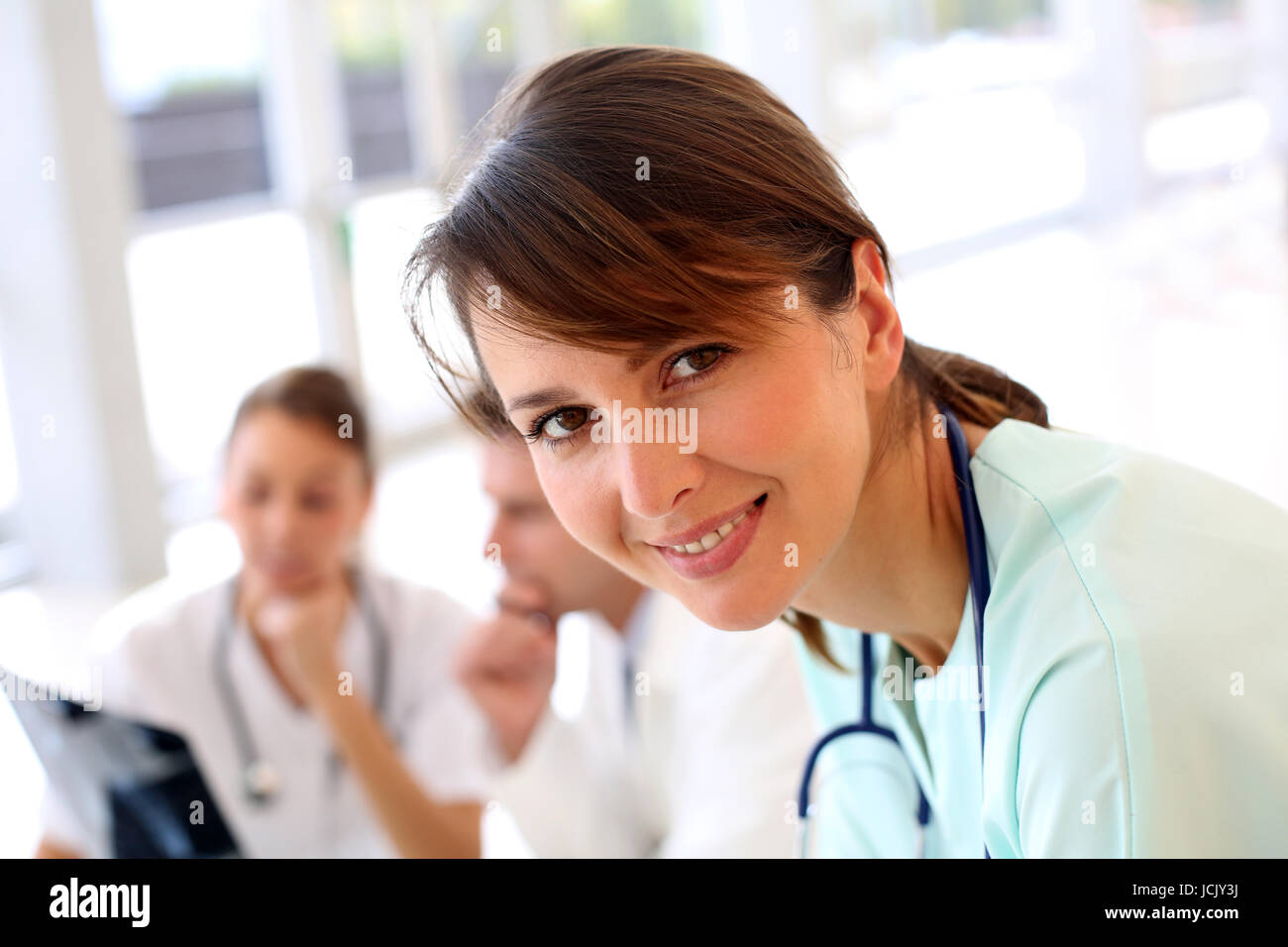 Attractive nurse working in hospital Stock Photo - Alamy