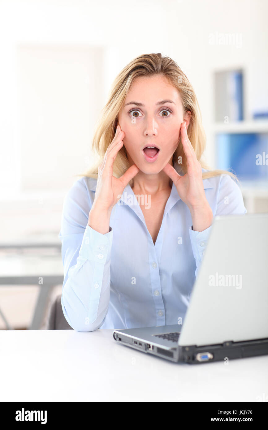 Portrait of businesswoman with scared look Stock Photo - Alamy