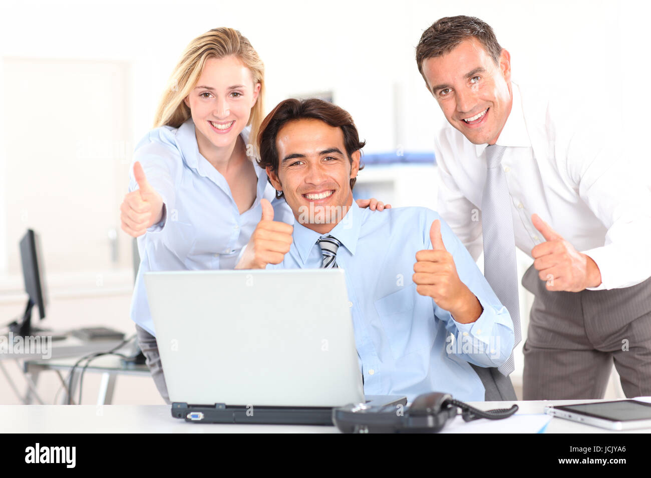 Cheerful business team in meeting Stock Photo - Alamy