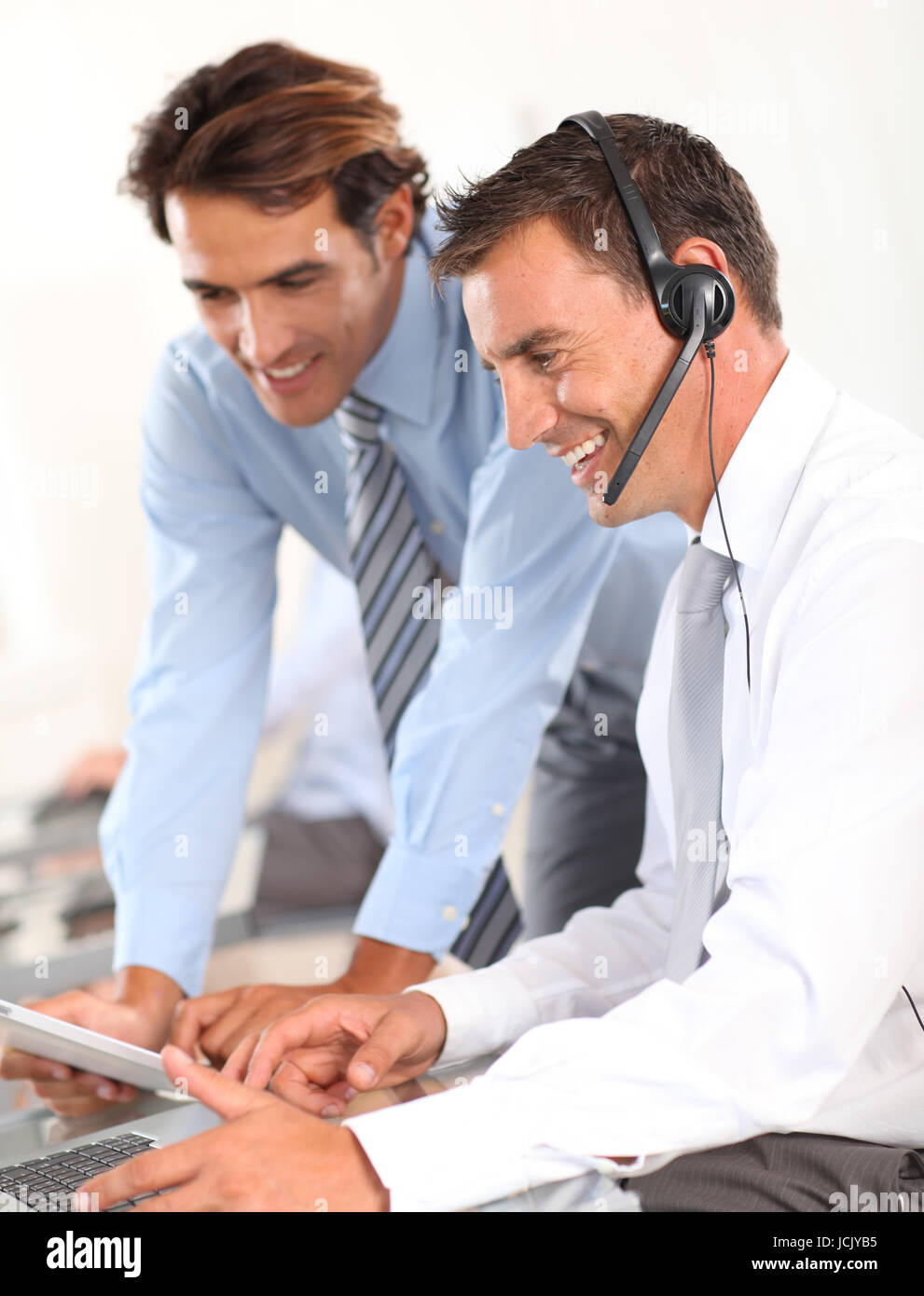 Business people working in call center Stock Photo - Alamy