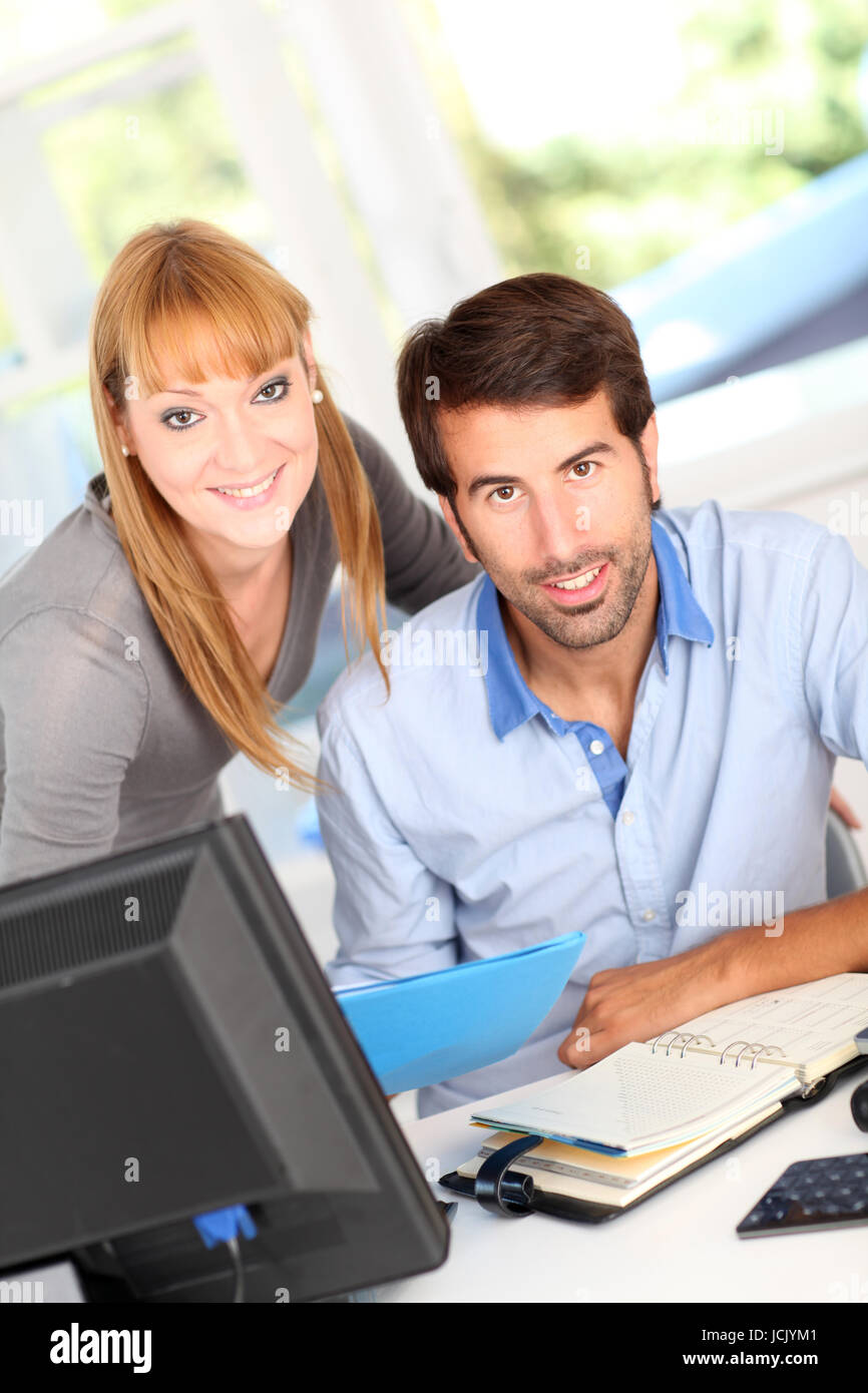 Portrait of smiling office workers Stock Photo - Alamy