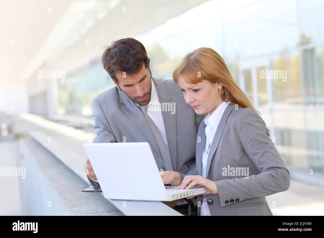 Business people meeting outside the office Stock Photo - Alamy