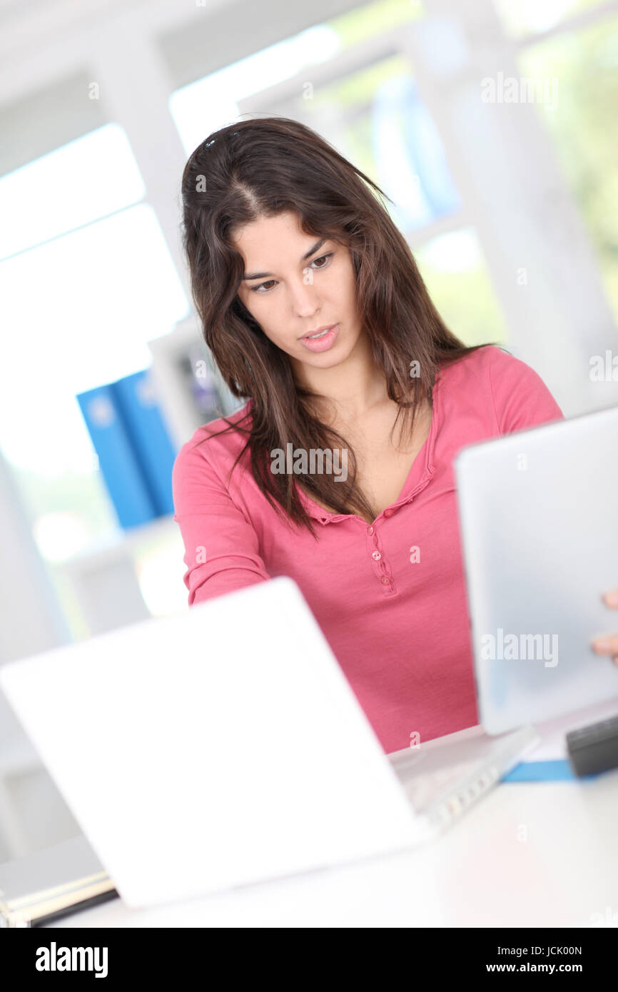 Closeup on office worker using electronic tablet Stock Photo - Alamy