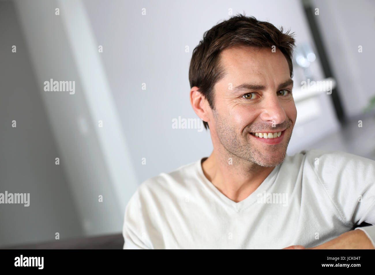 Portrait of middle-aged smiling man Stock Photo - Alamy