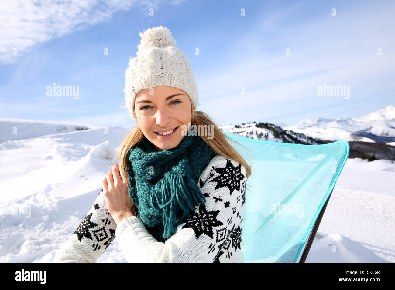Portrait of beautiful woman in snowy mountain Stock Photo - Alamy
