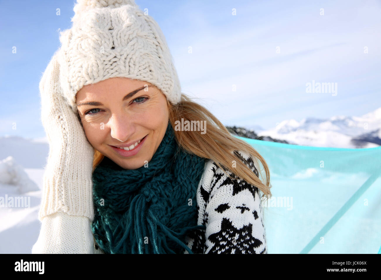 Portrait of beautiful woman in snowy mountain Stock Photo - Alamy