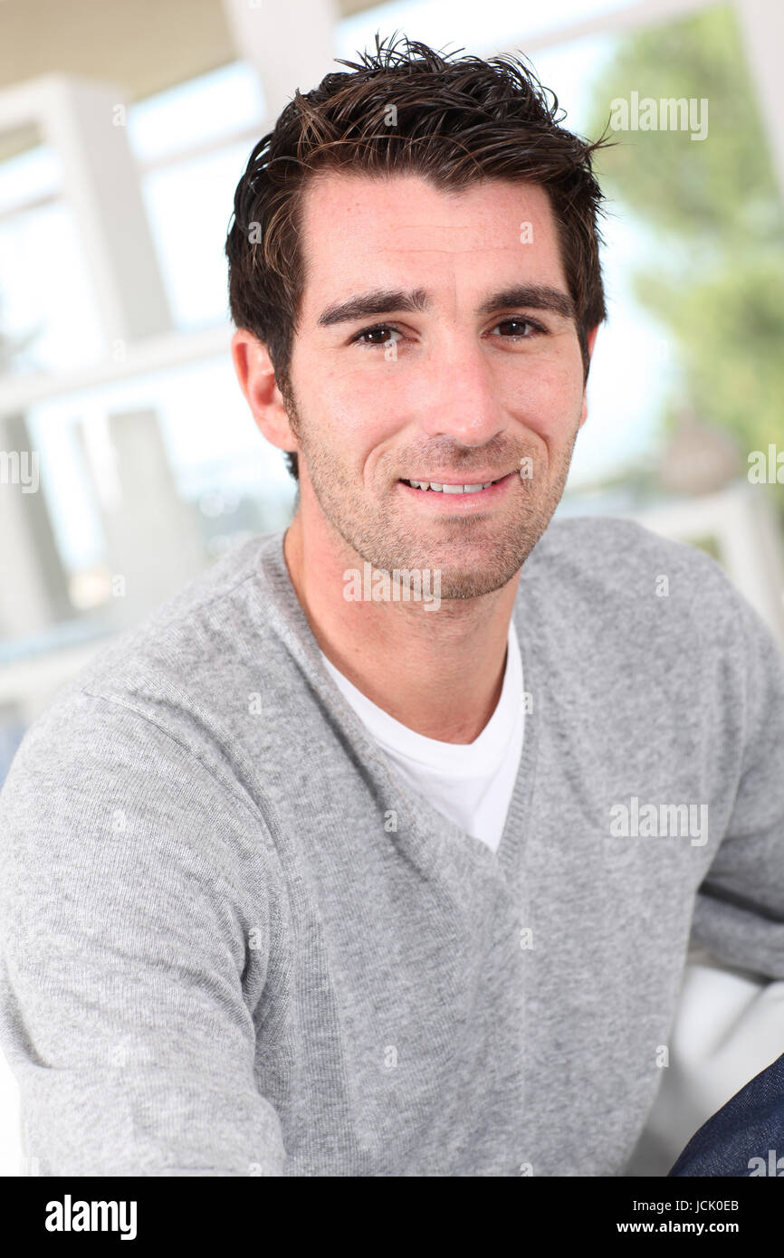 Portrait of smiling relaxed man Stock Photo - Alamy