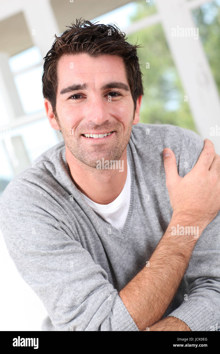 Portrait of smiling relaxed man Stock Photo - Alamy
