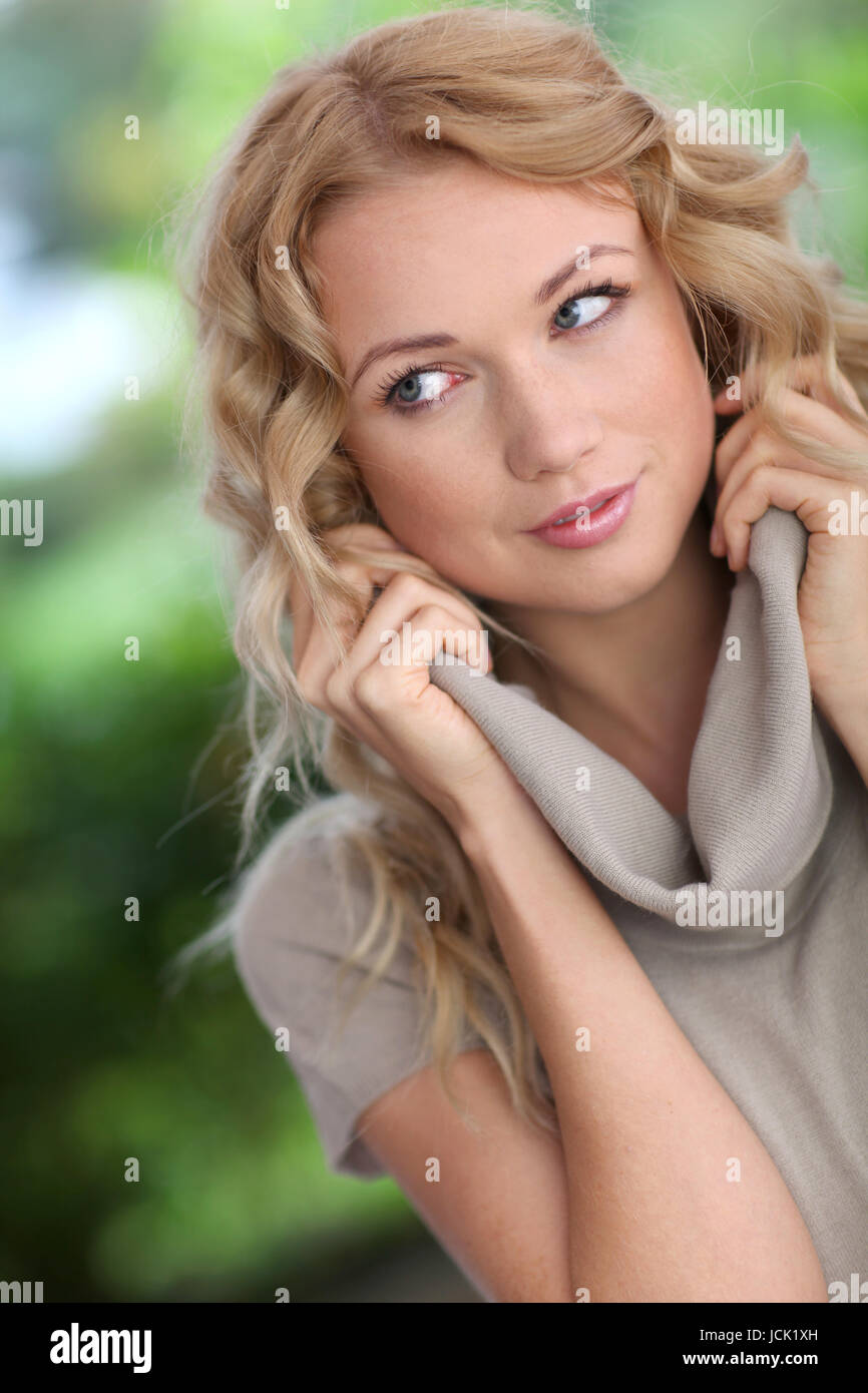 Portrait of cheerful attractive woman Stock Photo - Alamy