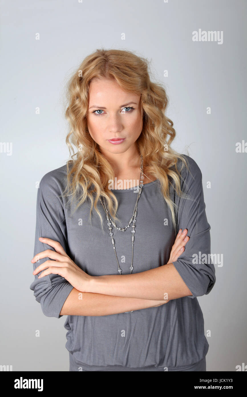 Portrait of beautiful woman with serious look Stock Photo - Alamy