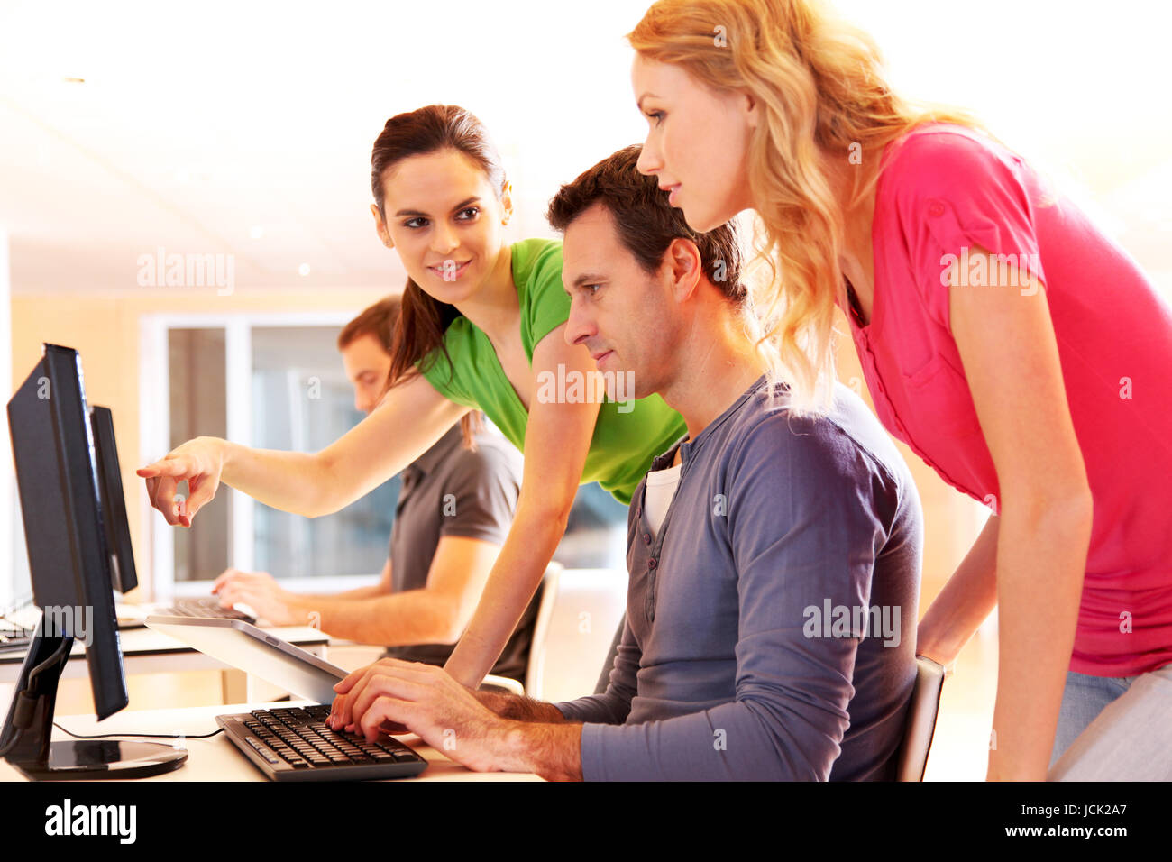 Students in computing training class Stock Photo - Alamy