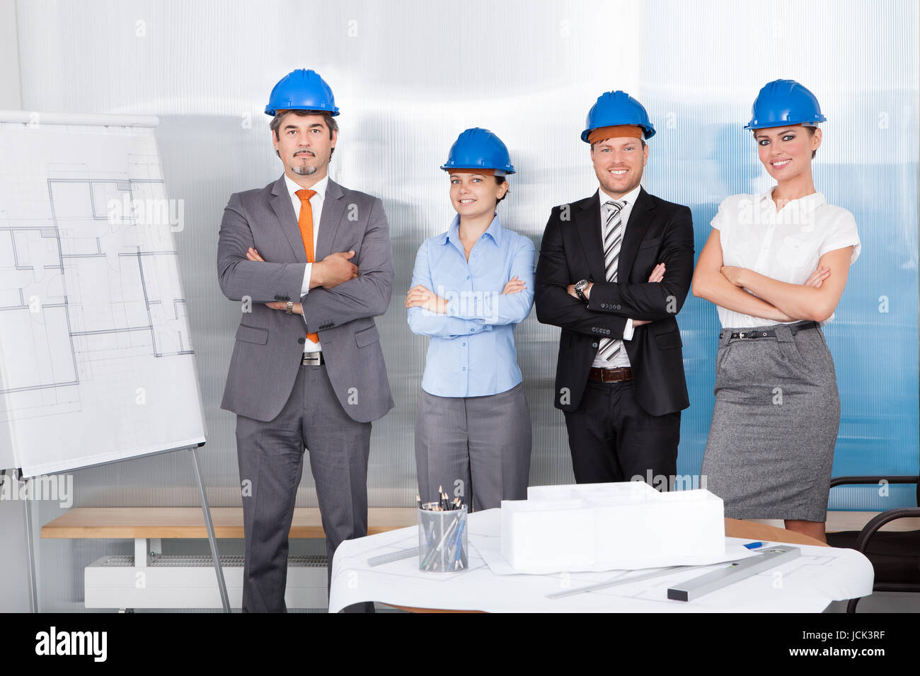 Portrait Of Successful Architects With Arm Crossed Standing Together ...