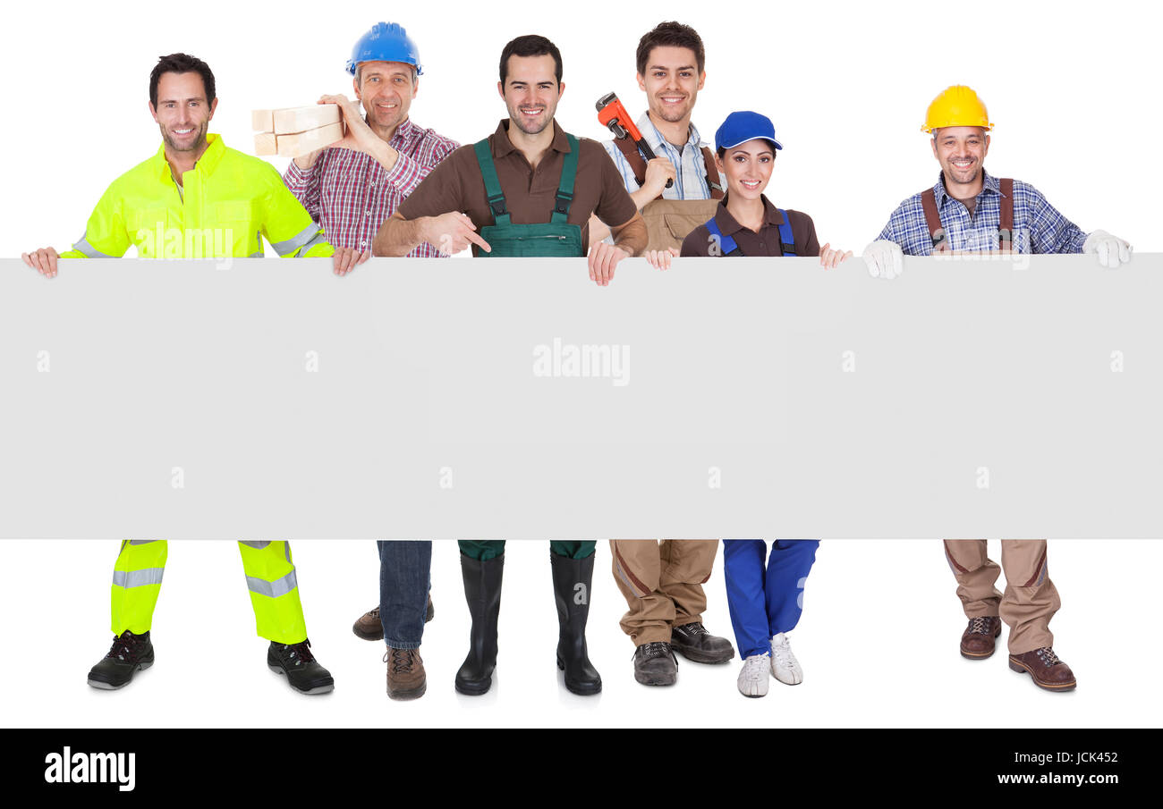 Group of workers presenting empty banner. Isolated on white Stock Photo ...