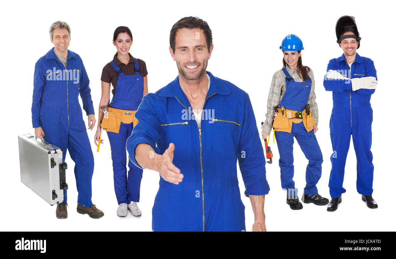 Chief mechanic and his team. Isolated on white background Stock Photo ...