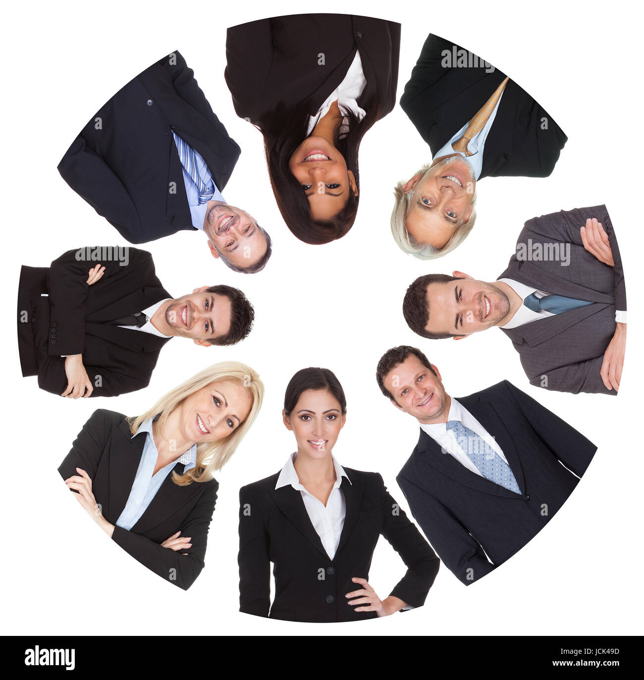Low angle view of diverse group of business people. Isolated on white ...