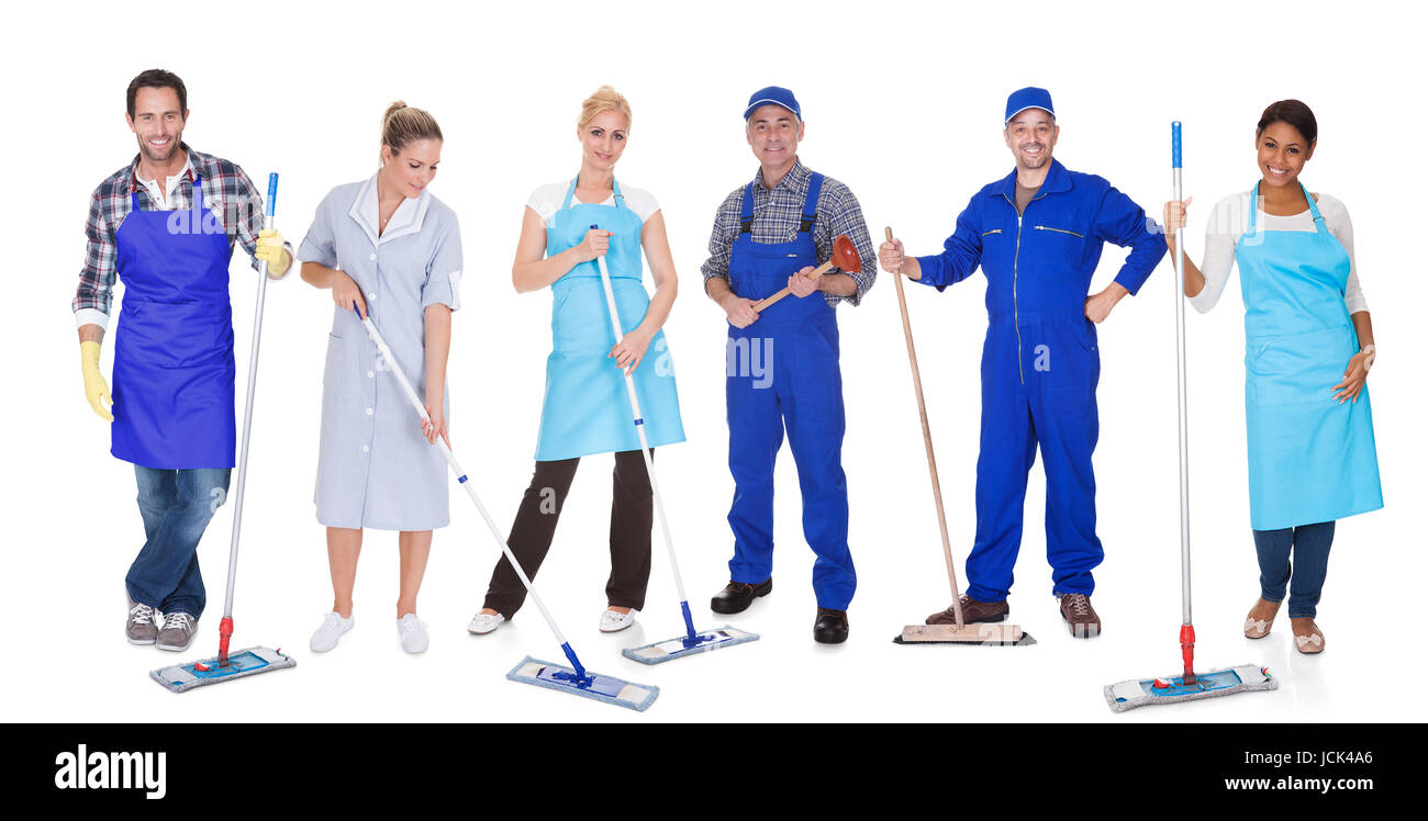 Multi Racial Group Of Cleaners Holding Mop Over White Background Stock ...