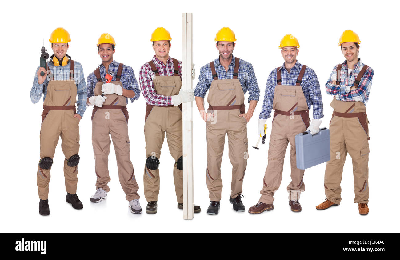 Group Of Happy Workers Holding Equipment Over White Background Stock ...