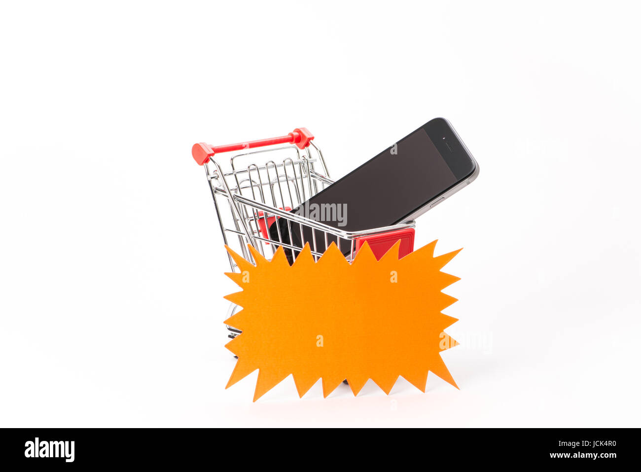 Caddy for shopping with smartphone on white background Stock Photo - Alamy