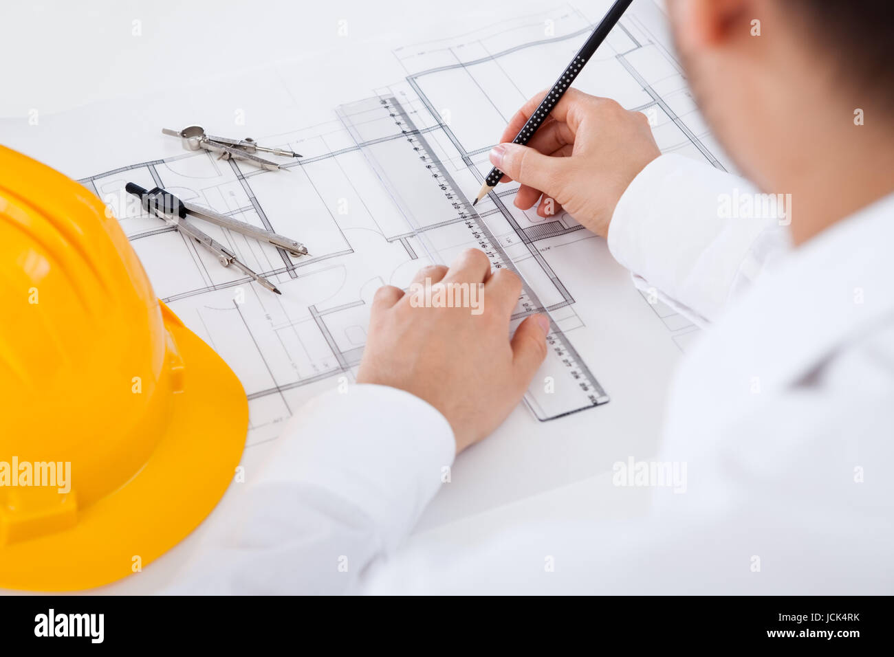 Blueprints hands writing construction hi-res stock photography and ...