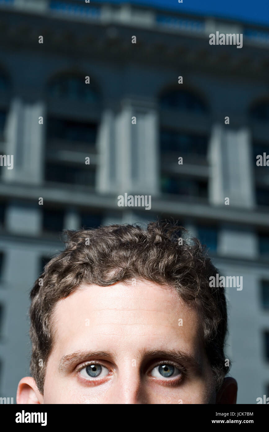 Man outside a building Stock Photo - Alamy
