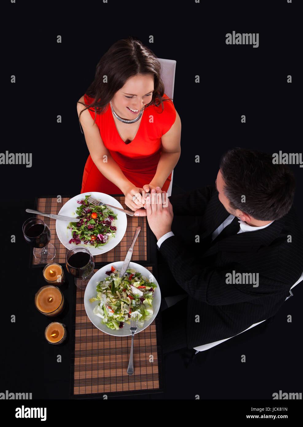 Overhead View Of Couple Eating Food At Restaurant Stock Photo - Alamy