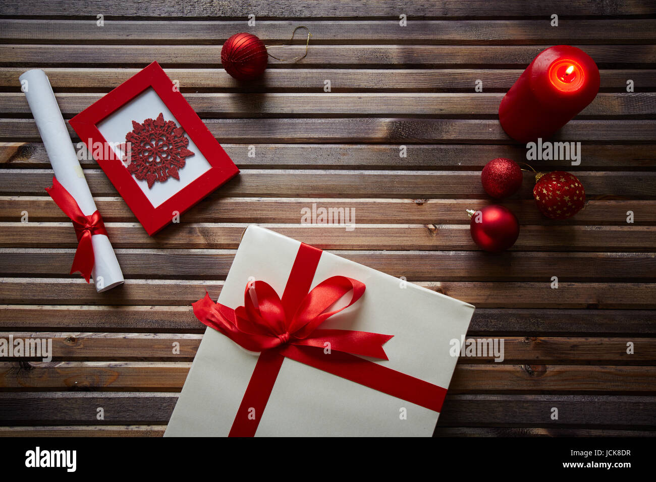 Different Christmas objects and symbols on wooden background Stock ...